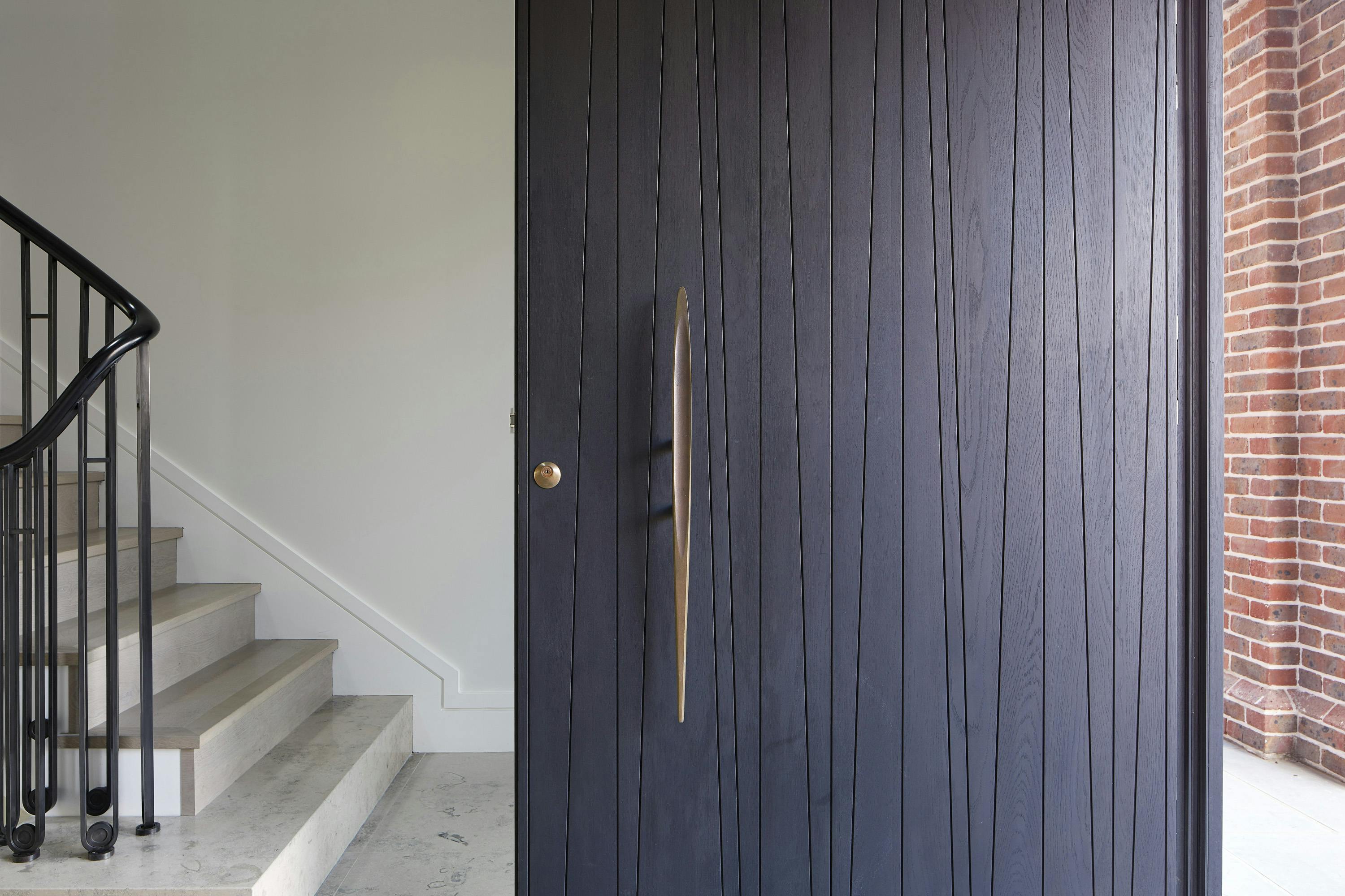 How to choose a door for a house with black cladding - Urban Front
